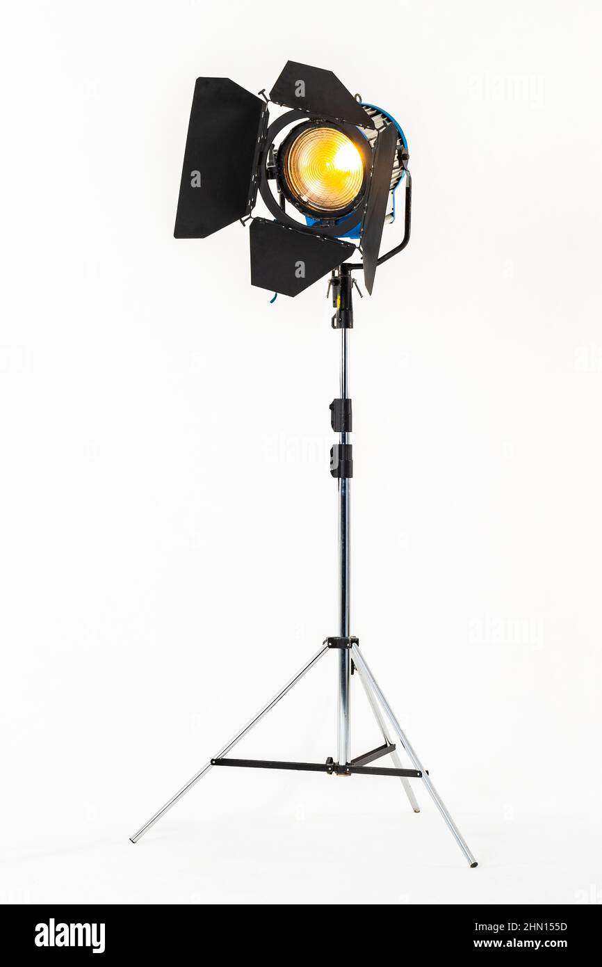 Film warm lighting, stage light with barndoors on a stand isolated on a ...