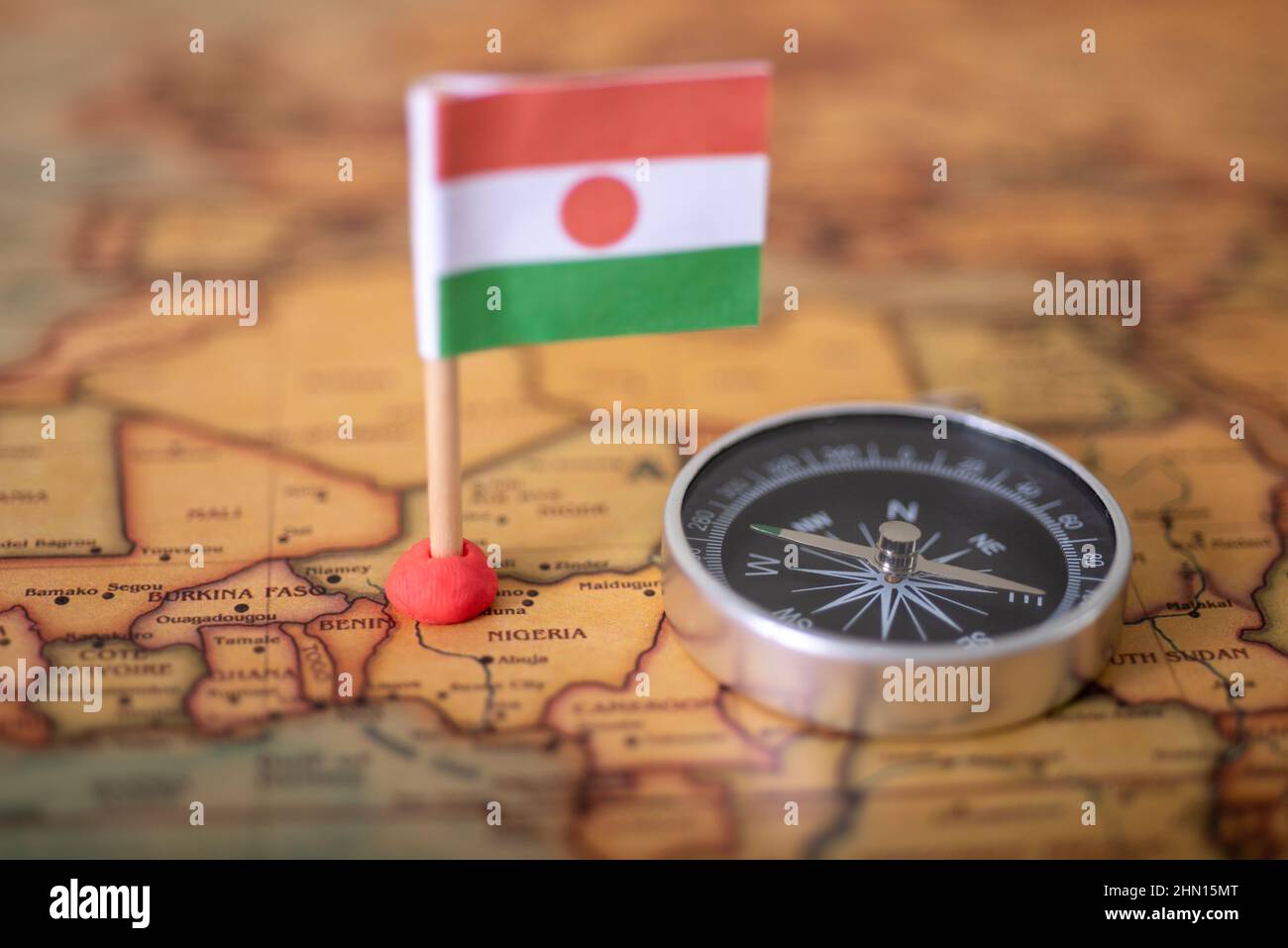 Niger flag and compass on the world map. The concept of travel and ...