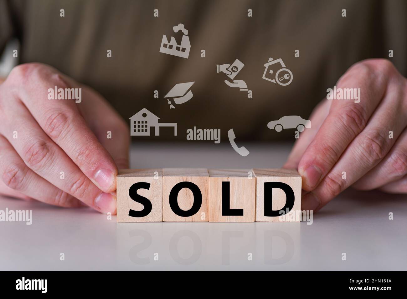 Sold. Cube wooden block with alphabet building the word SOLD. Factory ...