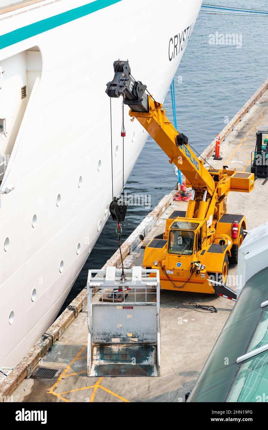 crane loading goods onto cruise ship port of Vancouver British Columbia ...