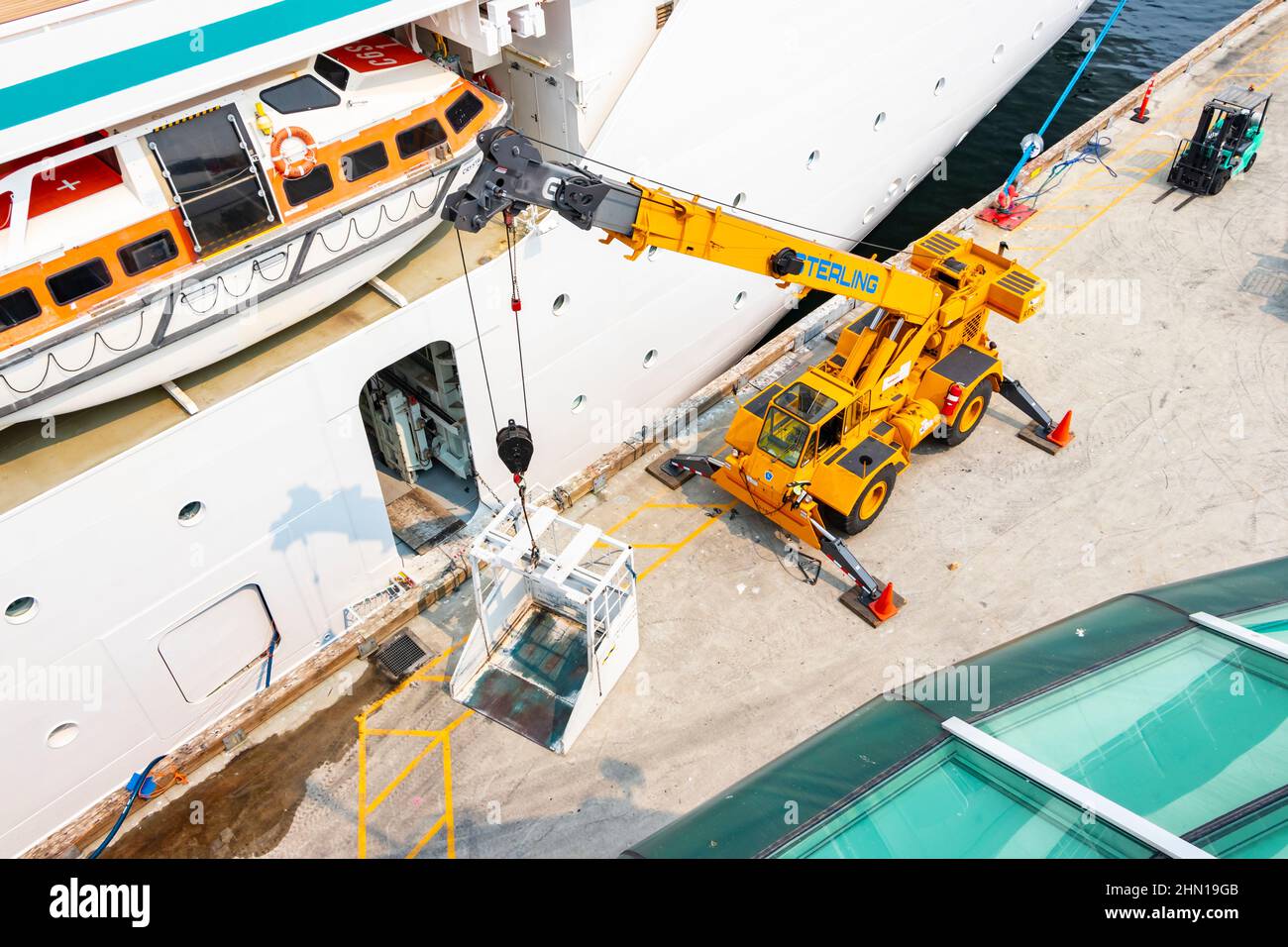 crane loading goods onto cruise ship port of Vancouver British Columbia ...