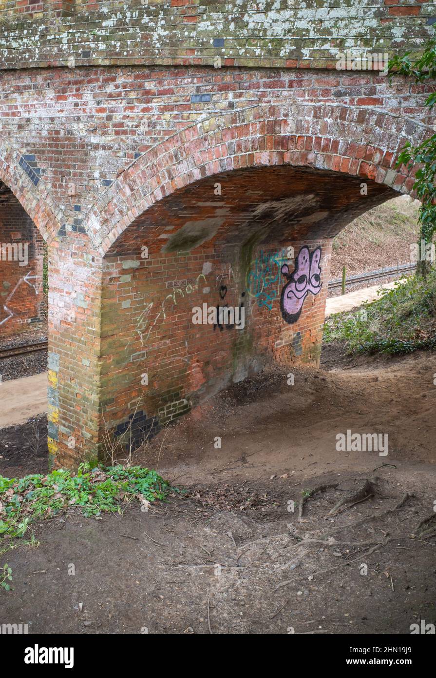 Bridge constructed from red brick over the Bure Valley Railway line in ...