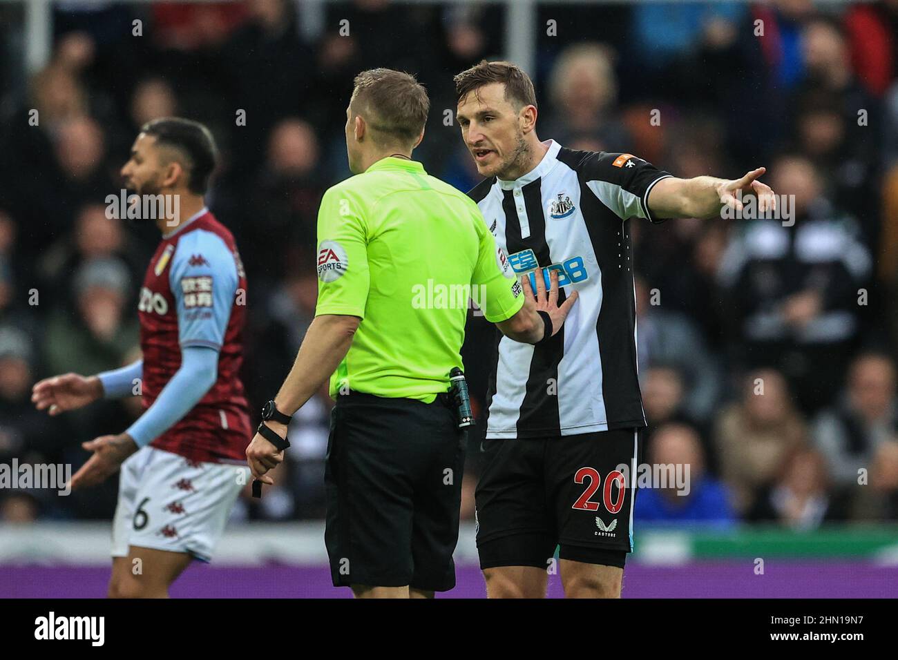 Newcastle, UK. 13th Feb, 2022. Referee Craig Pawson pushes Chris Wood ...