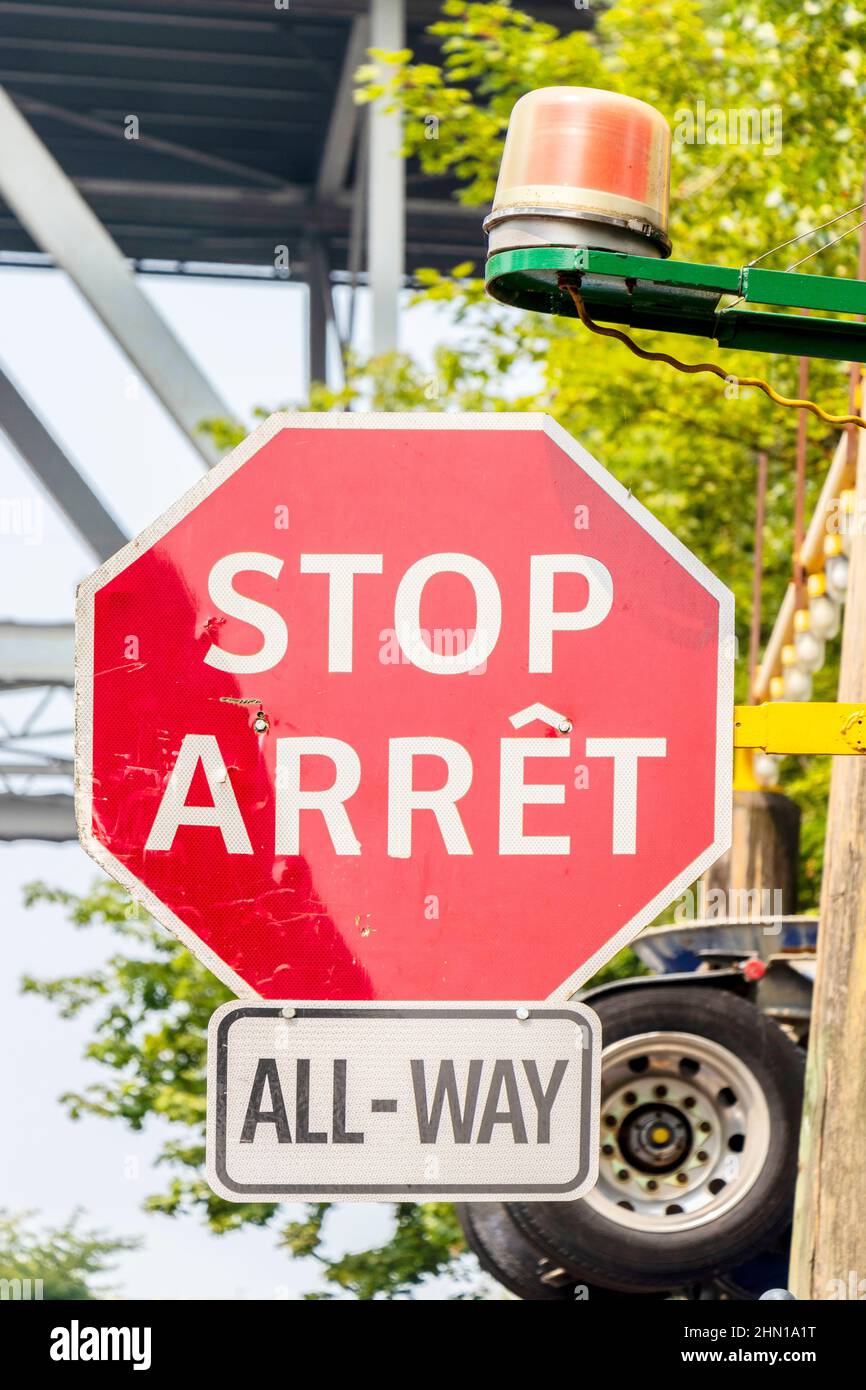 detail of bilingual all way stop sign in Vancouver Canada with French ...