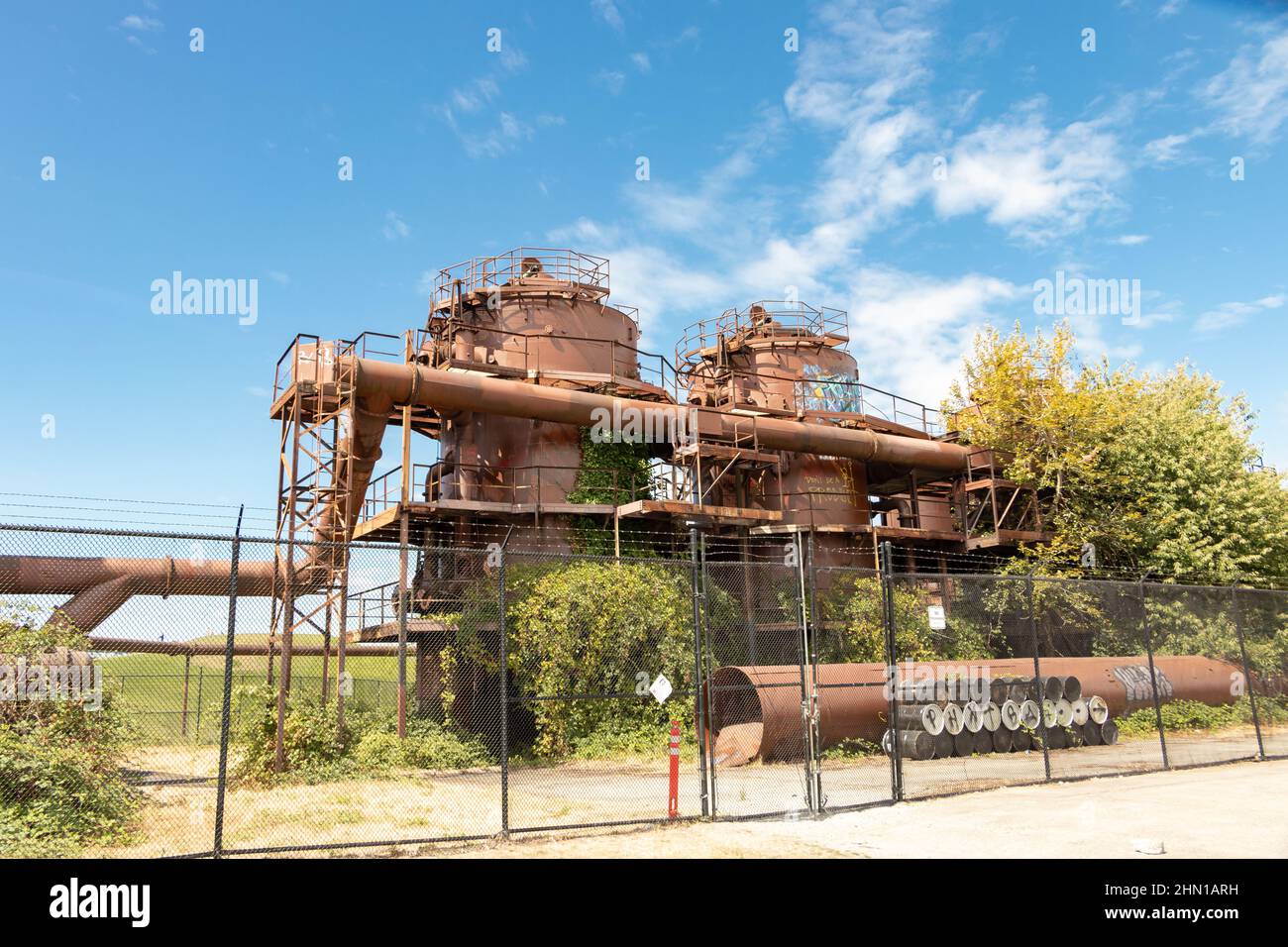 rusty pipework and metal silos ay Gas works park Seattle Washingtom ...