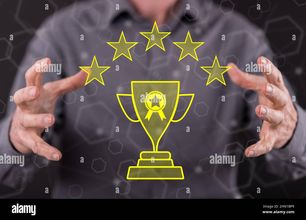 Best quality concept between hands of a man in background Stock Photo ...