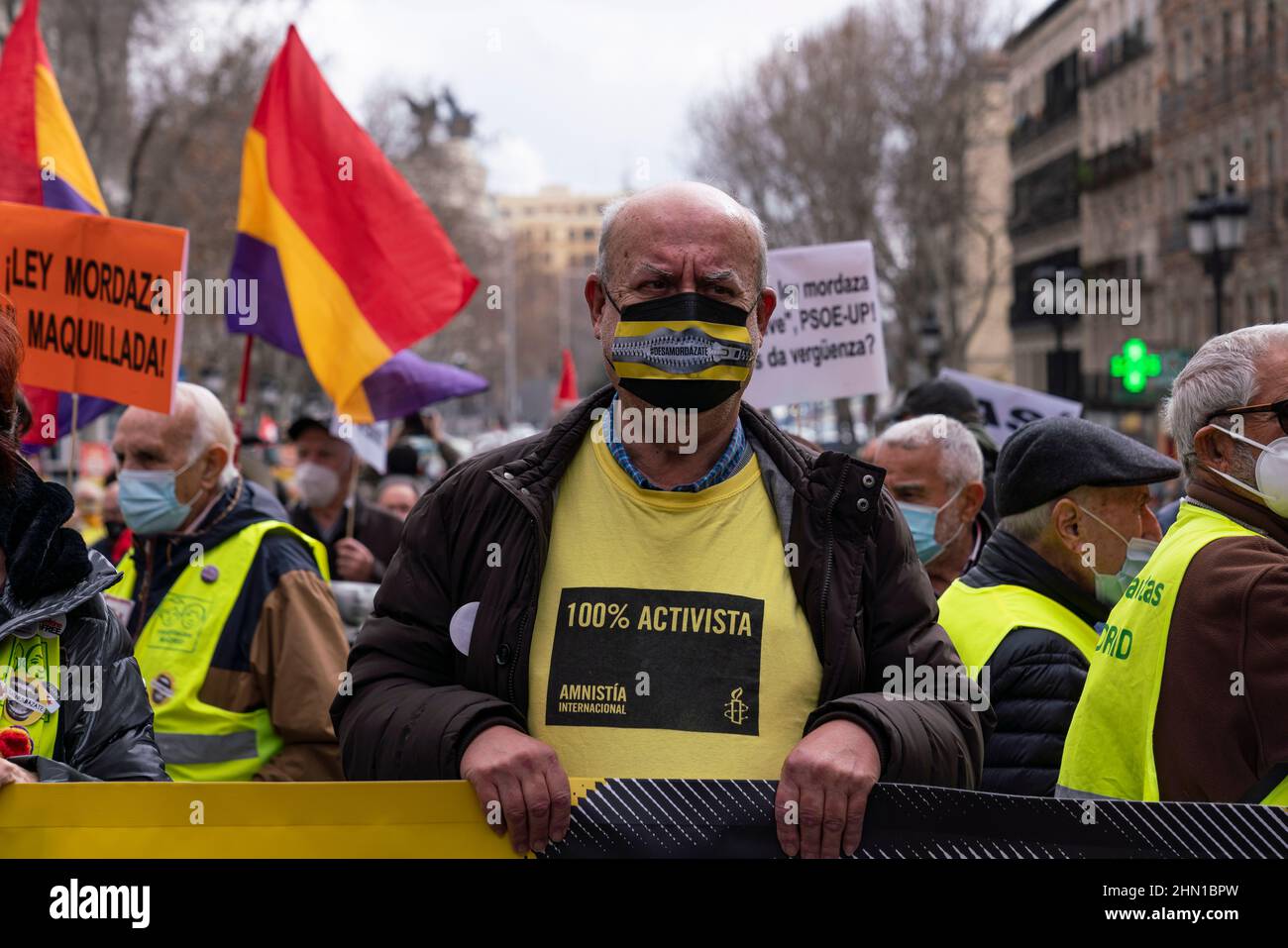 Madrid, Spain. 13th Feb, 2022. A demonstrator is seen wearing a ...