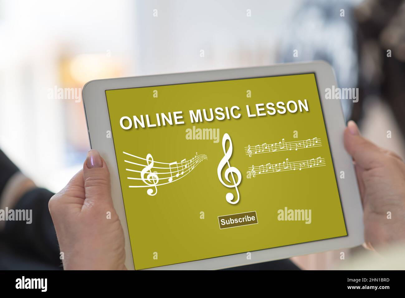 Tablet screen displaying an online music lesson concept Stock Photo - Alamy