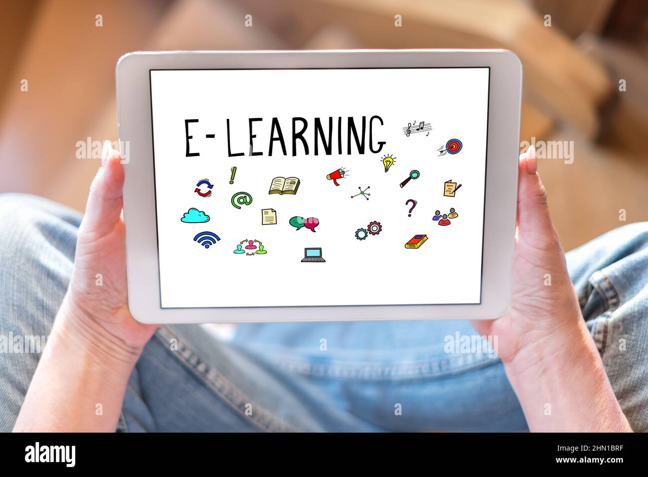 Tablet screen displaying an e-learning concept Stock Photo - Alamy