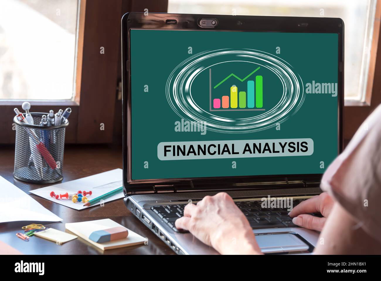 Laptop screen displaying a financial analysis concept Stock Photo - Alamy