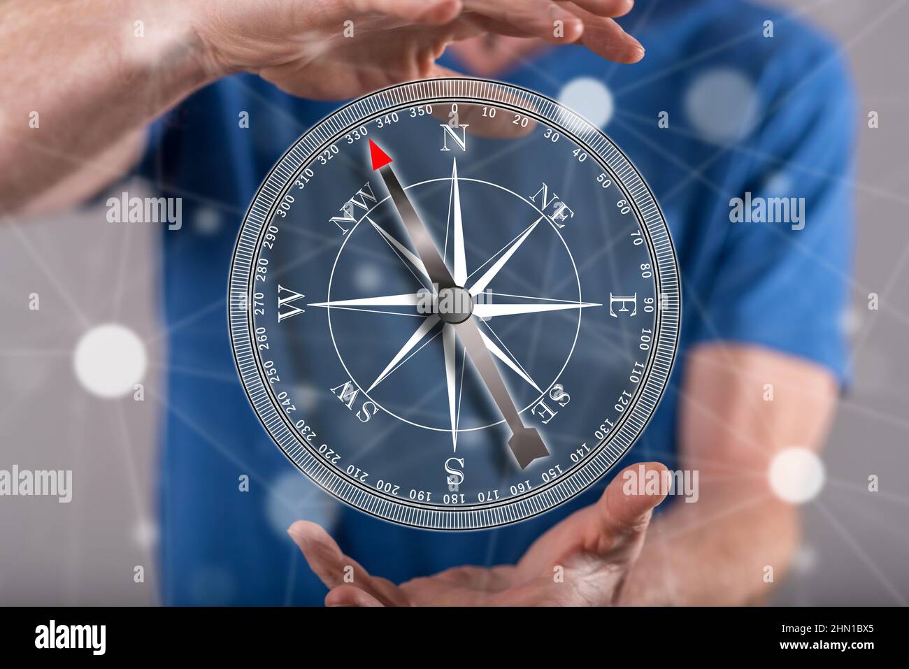 Right direction concept between hands of a man in background Stock ...