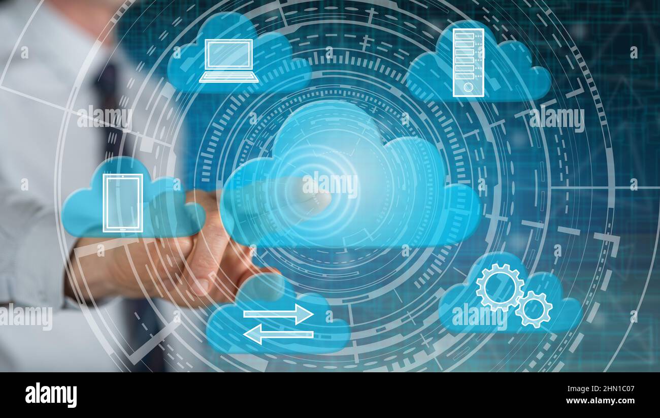 Man touching a cloud computing concept on a touch screen with his ...