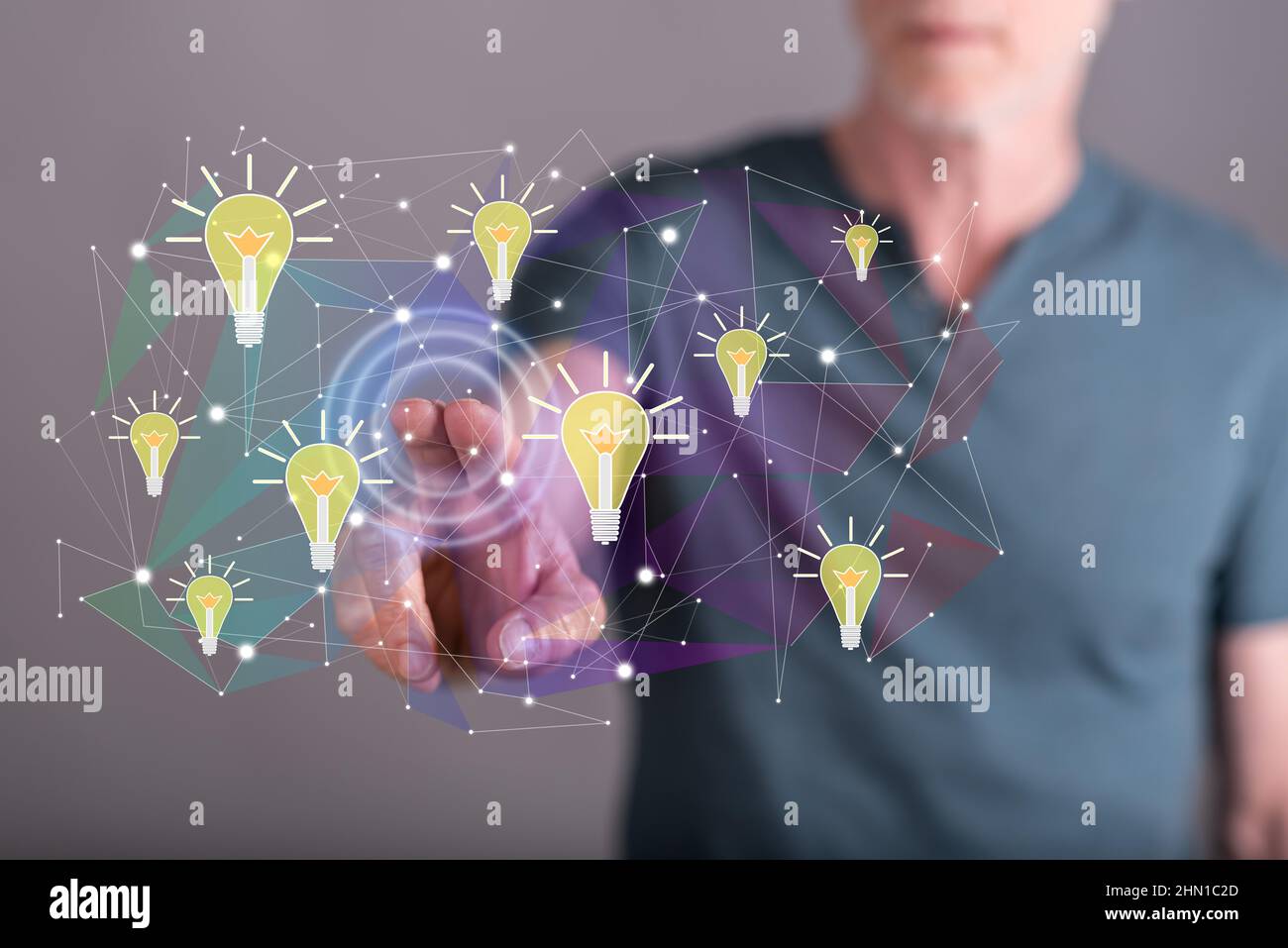 Man touching an innovation concept on a touch screen with his finger ...