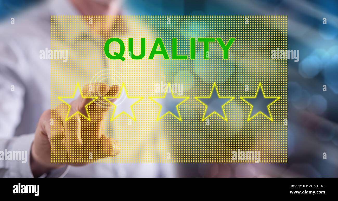 Man touching a quality concept on a touch screen with his finger Stock ...