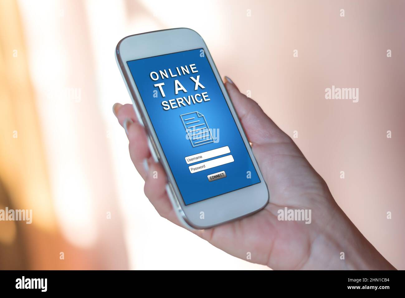 Smartphone screen displaying an online tax service concept Stock Photo ...