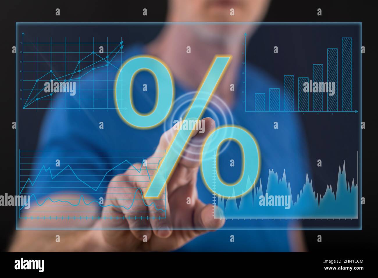 Man touching a digital interest rates datas on a touch screen with his ...