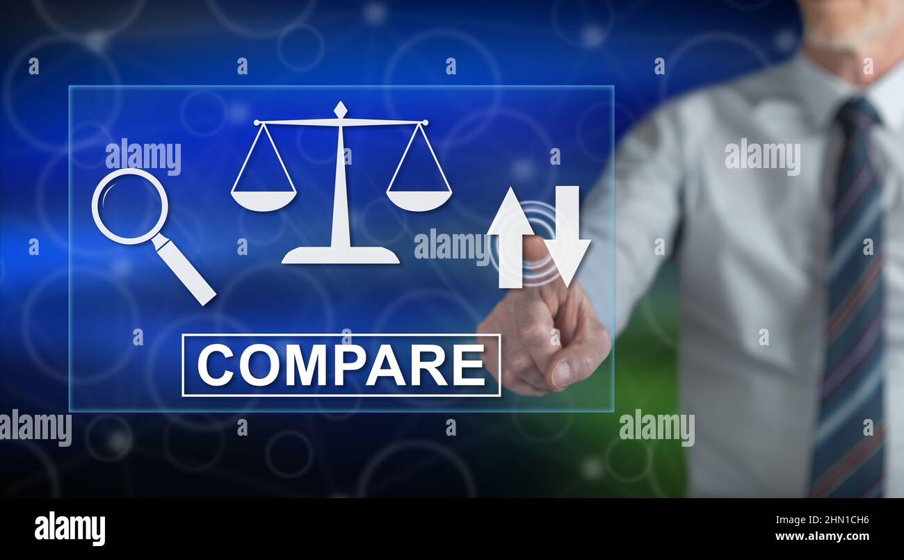 Man touching a compare concept on a touch screen with his finger Stock ...