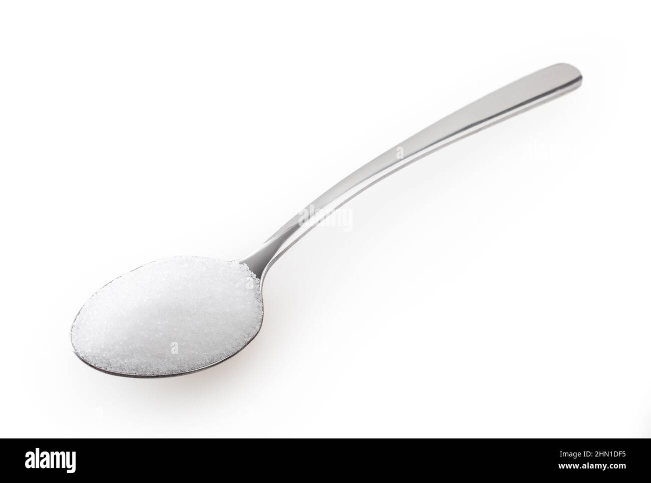 Spoon of salt isolated on white background with clipping path Stock ...