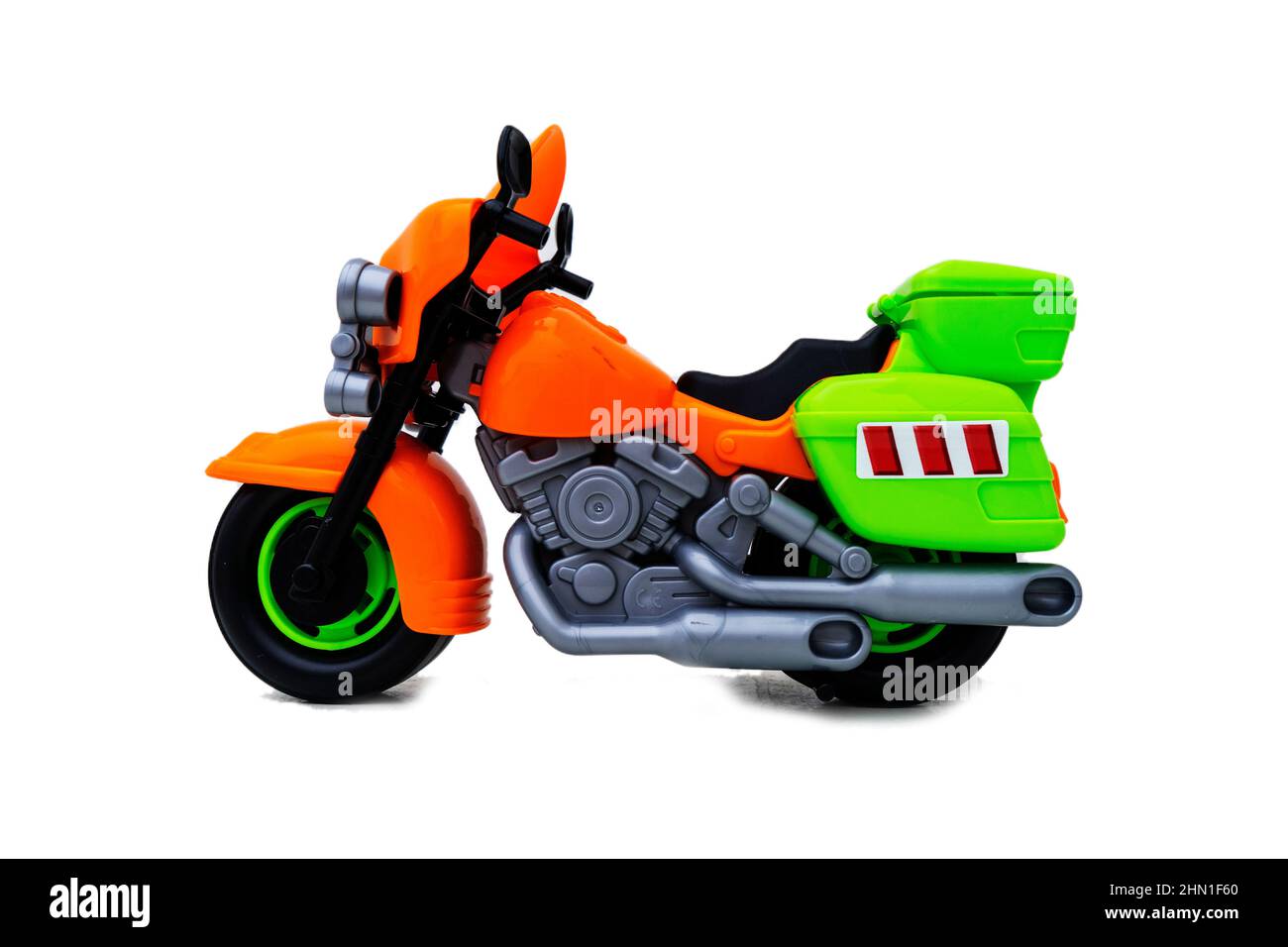 Children's plastic toy motorcycle on white background Stock Photo - Alamy