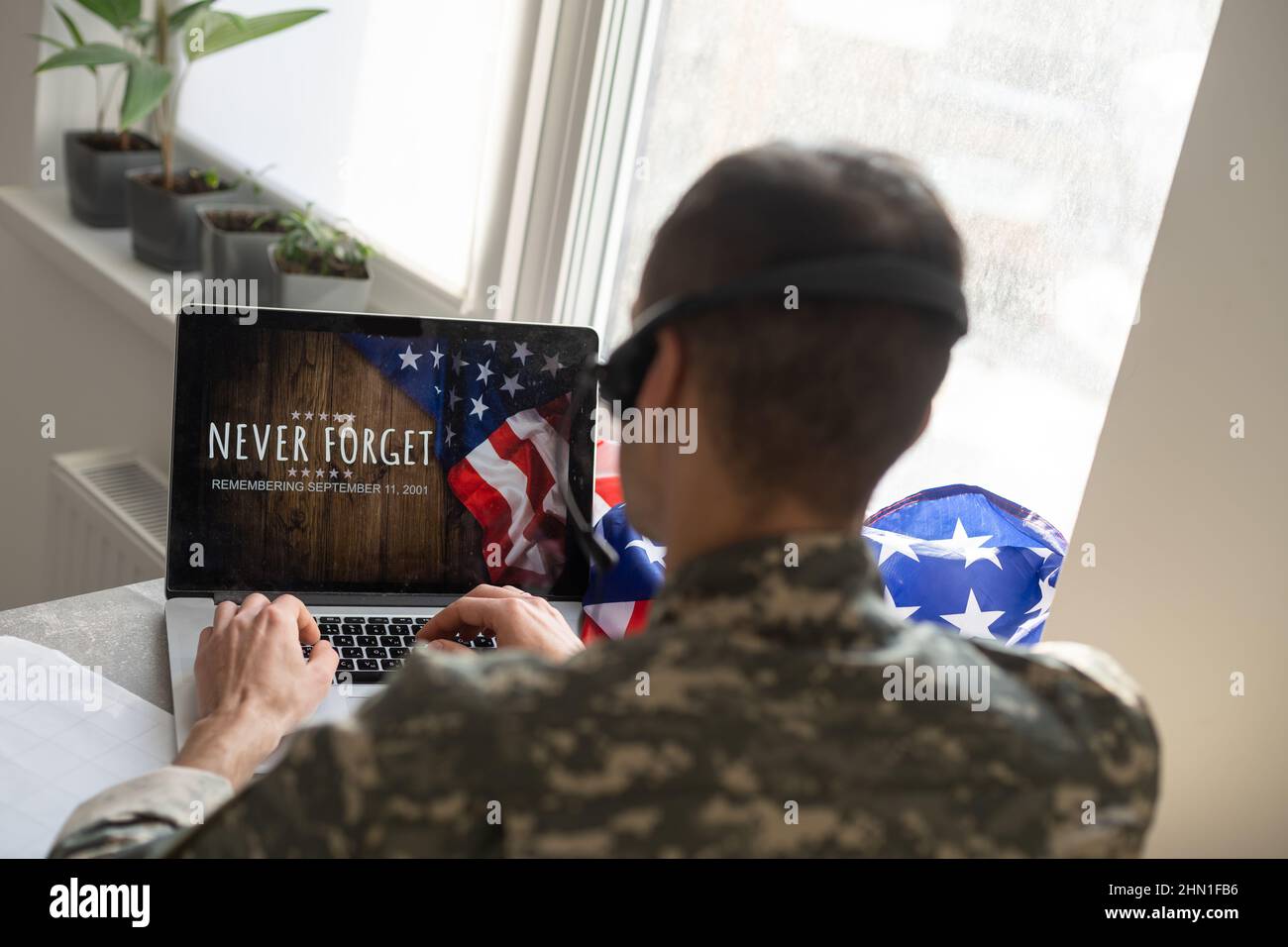 a army speaking video conferencing on computer using online video call ...