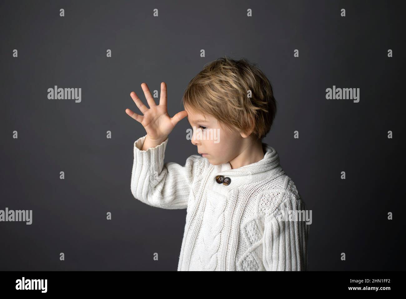 Cute little toddler boy, showing FATHER gesture in sign language on ...