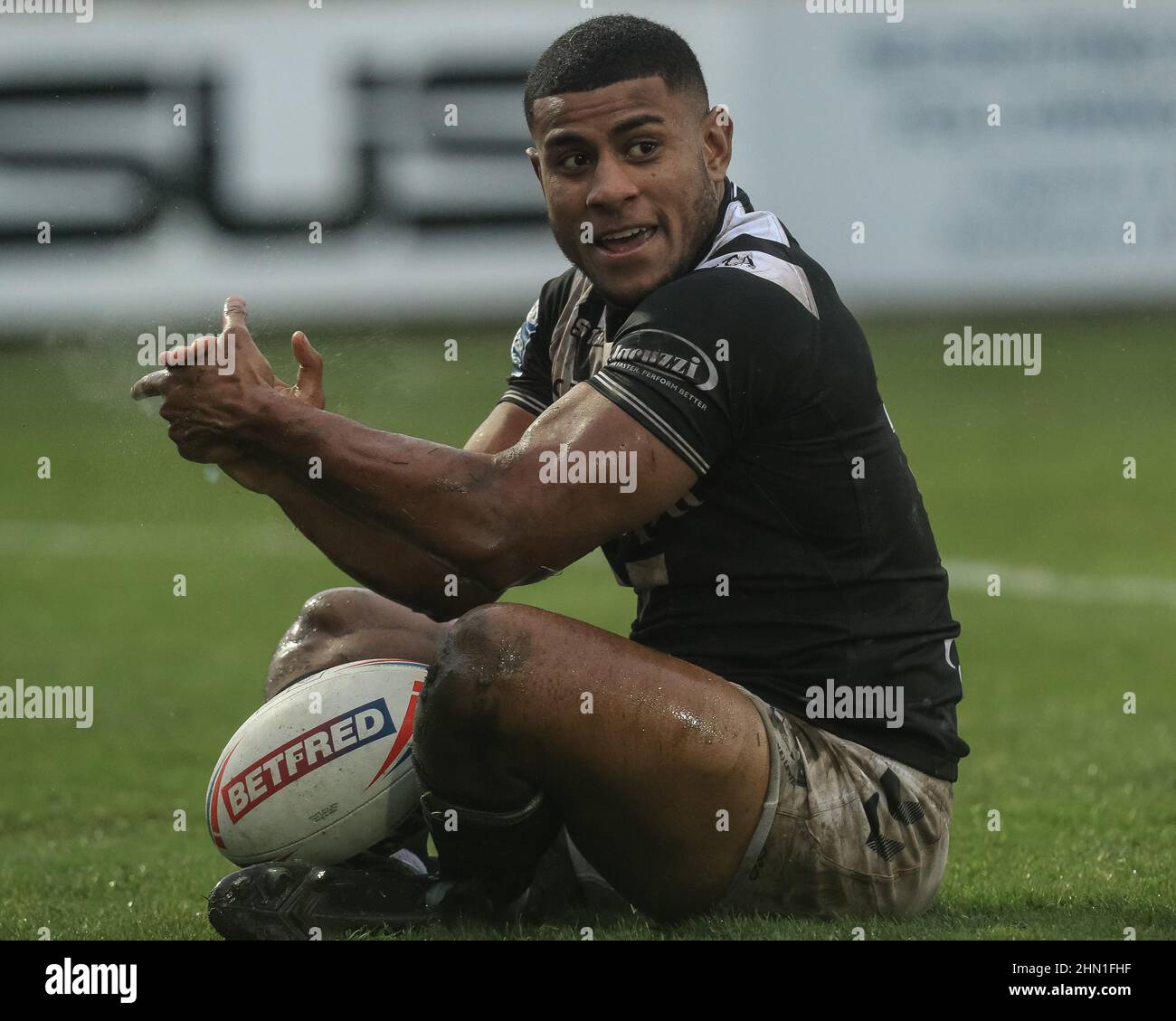 Joe Lovodua #14 of Hull FC goes over for a try and celebrates Stock ...