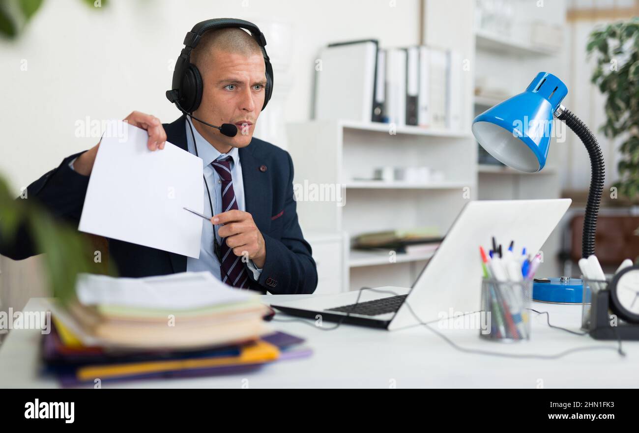 Legal counsel consulting his client via video call Stock Photo - Alamy
