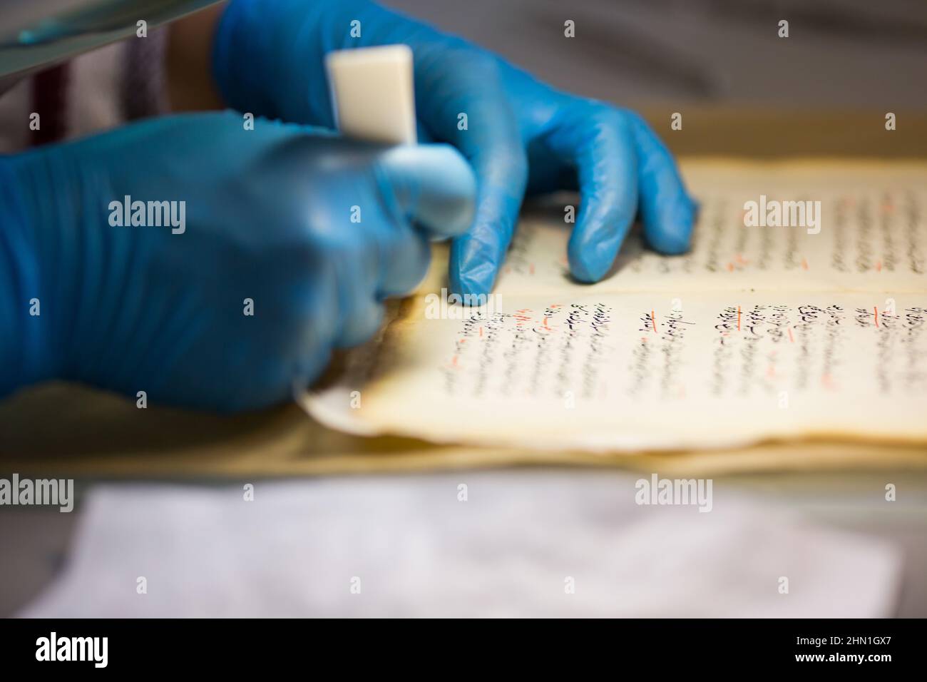 Restoring old Arabic papers in the science lab. Paper conservation and ...