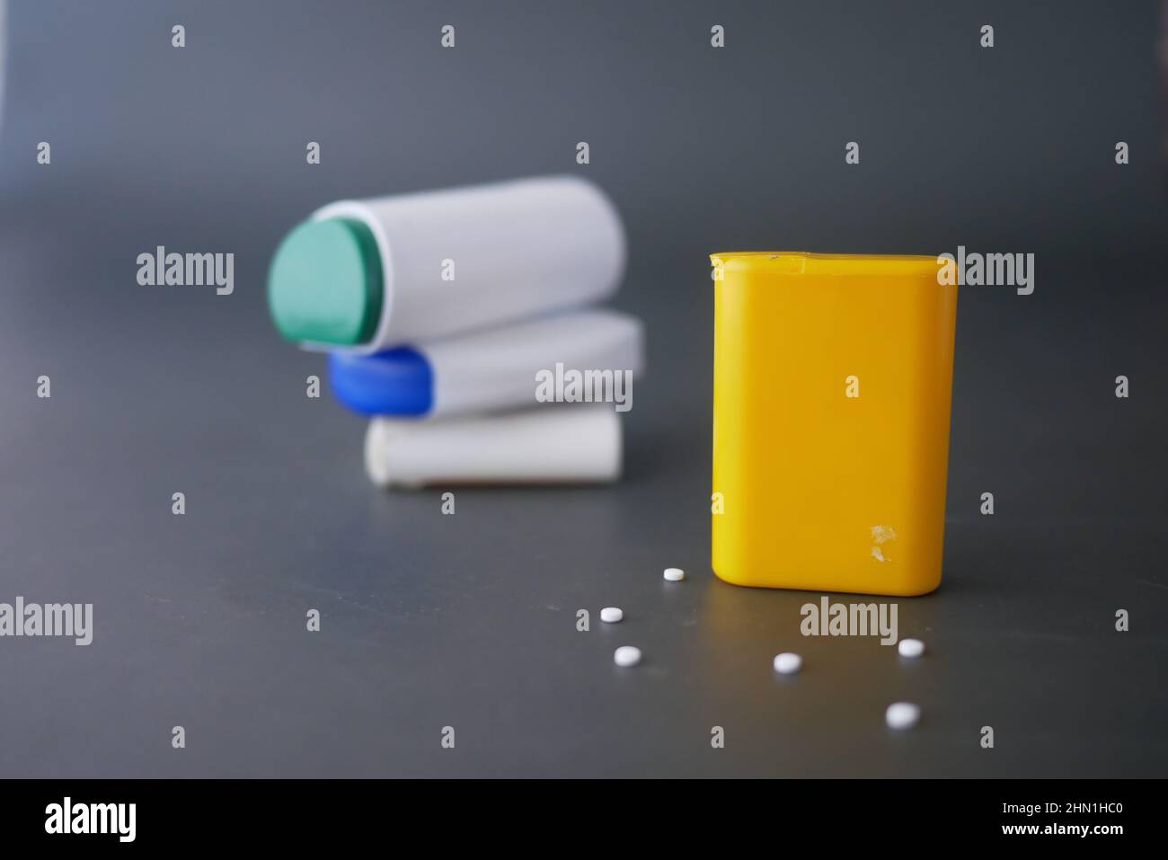 artificial sweetener container on black background Stock Photo - Alamy