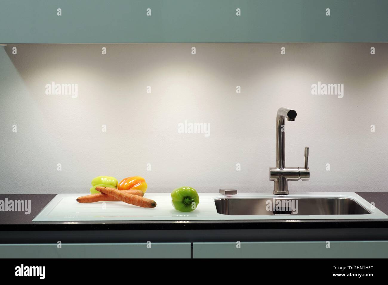 Modern kitchen in sunset, brand new interior design Stock Photo - Alamy
