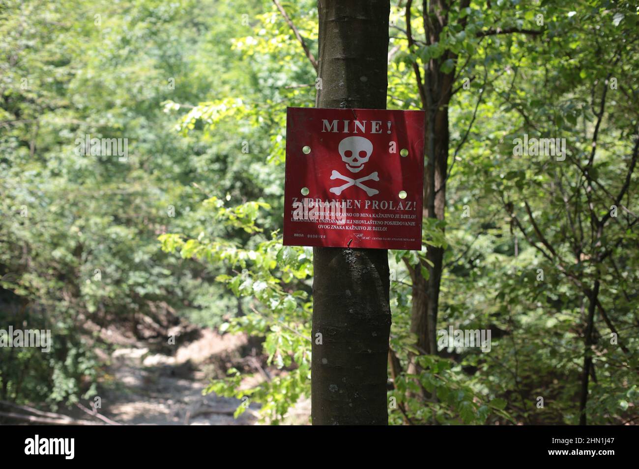 Watch the mines safety sign. Danger, caution, hazard Stock Photo - Alamy