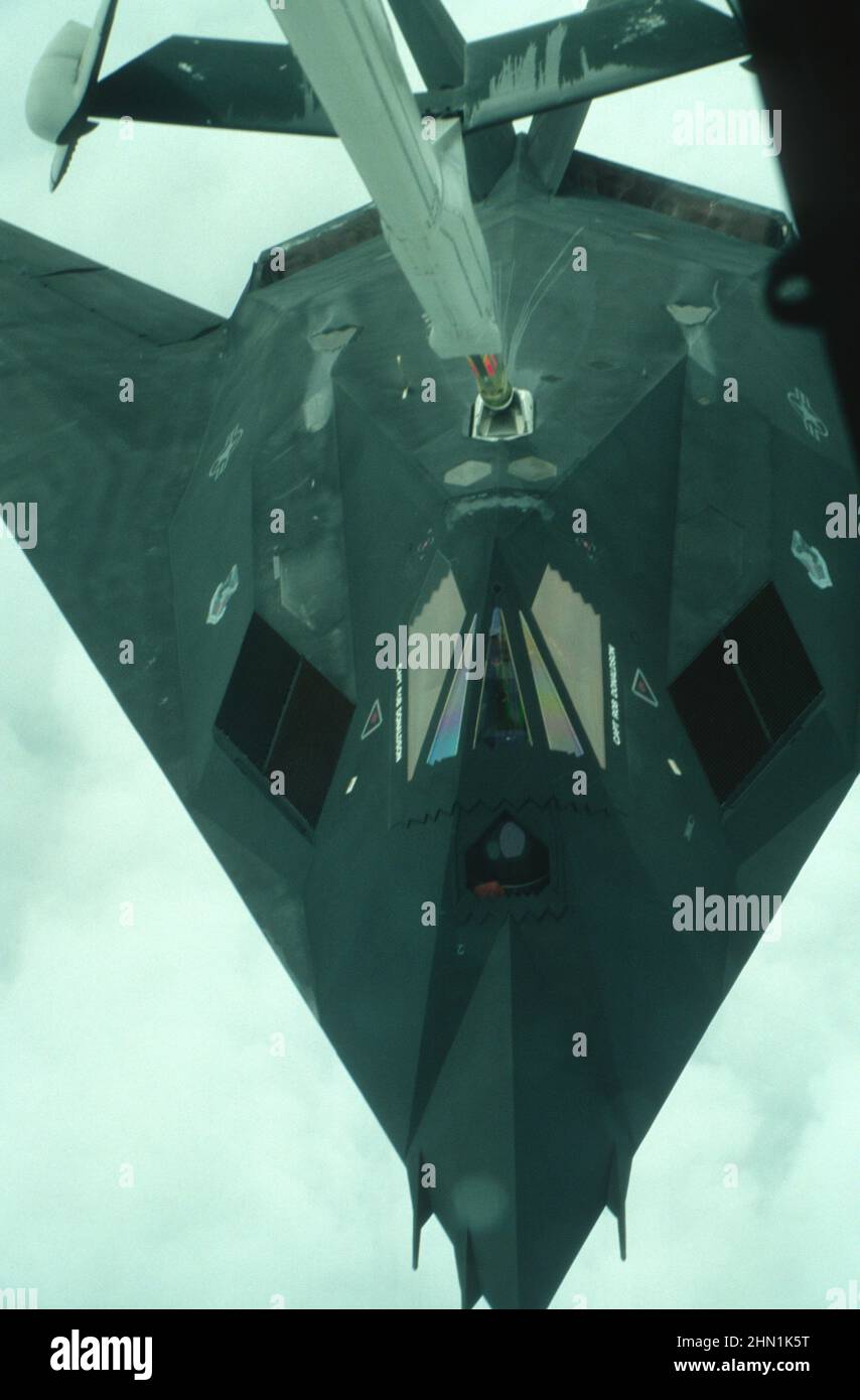 F-117A Stealth fighter performing aerial refueling from a KC-10 ...