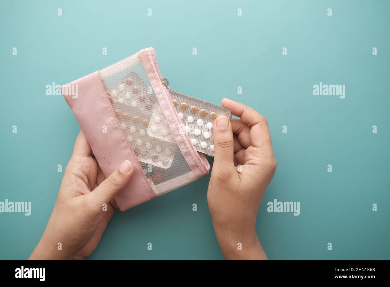 Women hand holding birth control hi-res stock photography and images ...