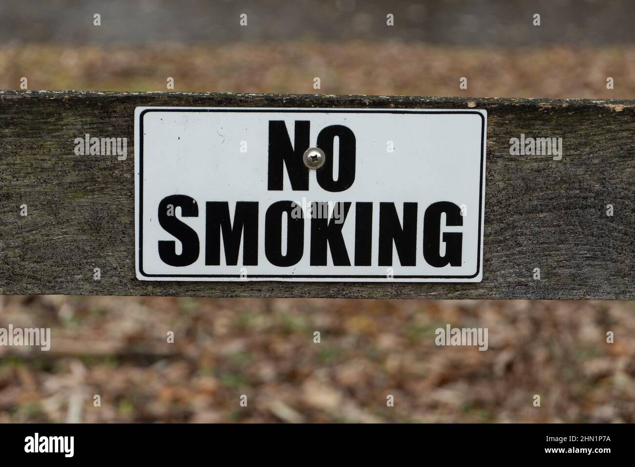 No Smoking sign on rustic fence post for information permitting smoking ...