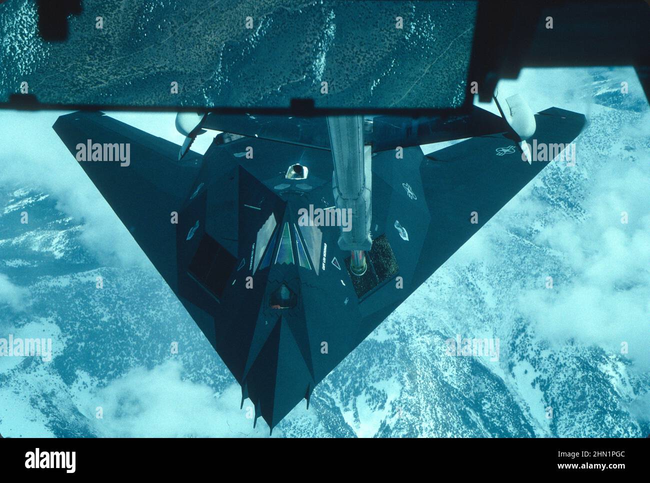 F-117A Stealth fighter performing aerial refueling from a KC-10 ...