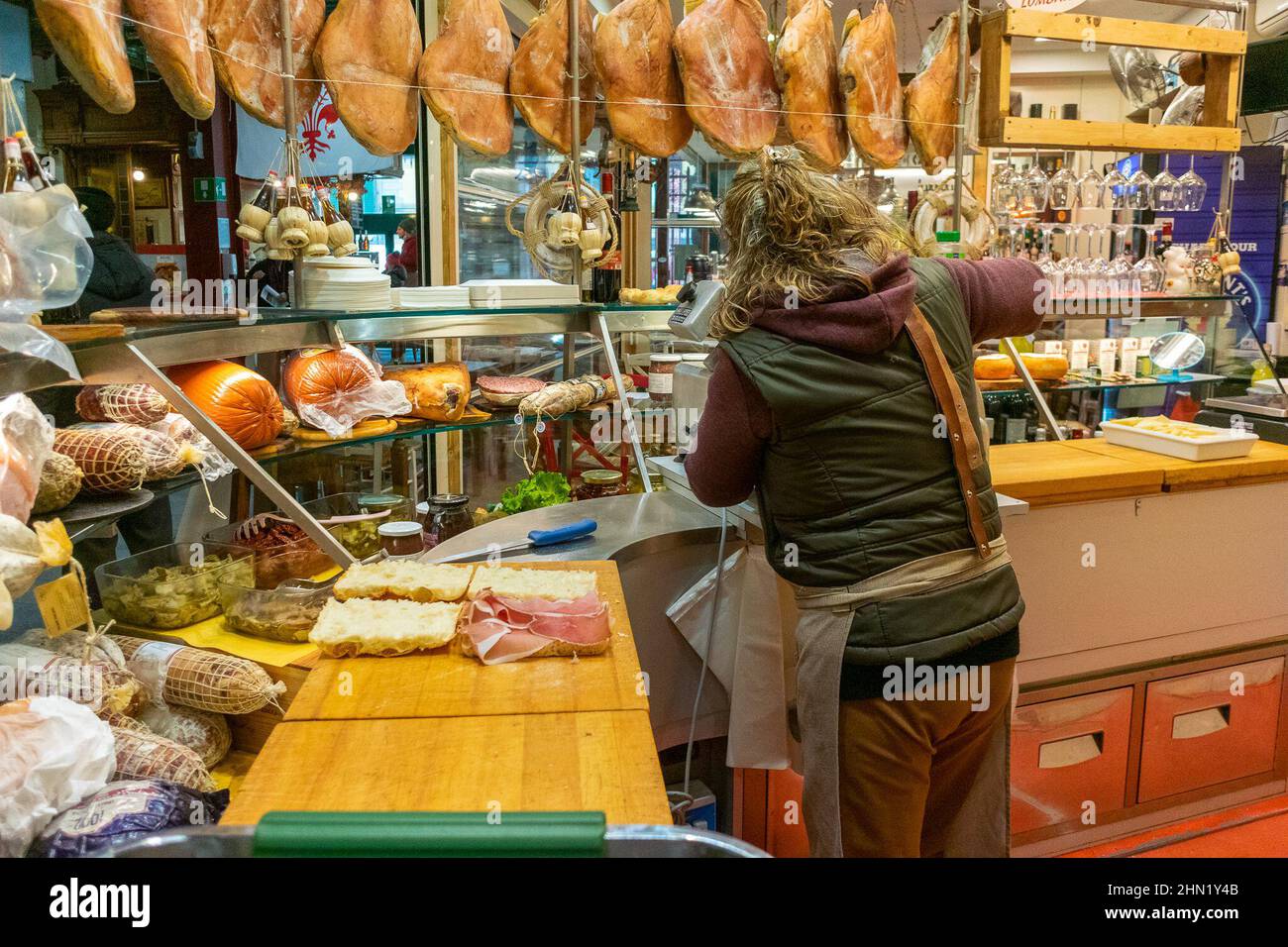 Florence, Italy, Woman Clerk Working inside, Italian Public food Market ...