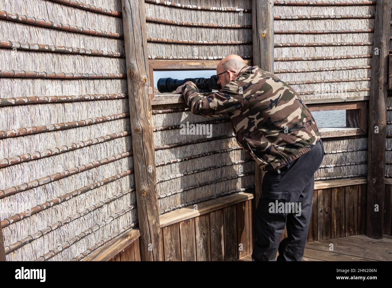 Wildlife photographer in camouflage hi-res stock photography and images ...