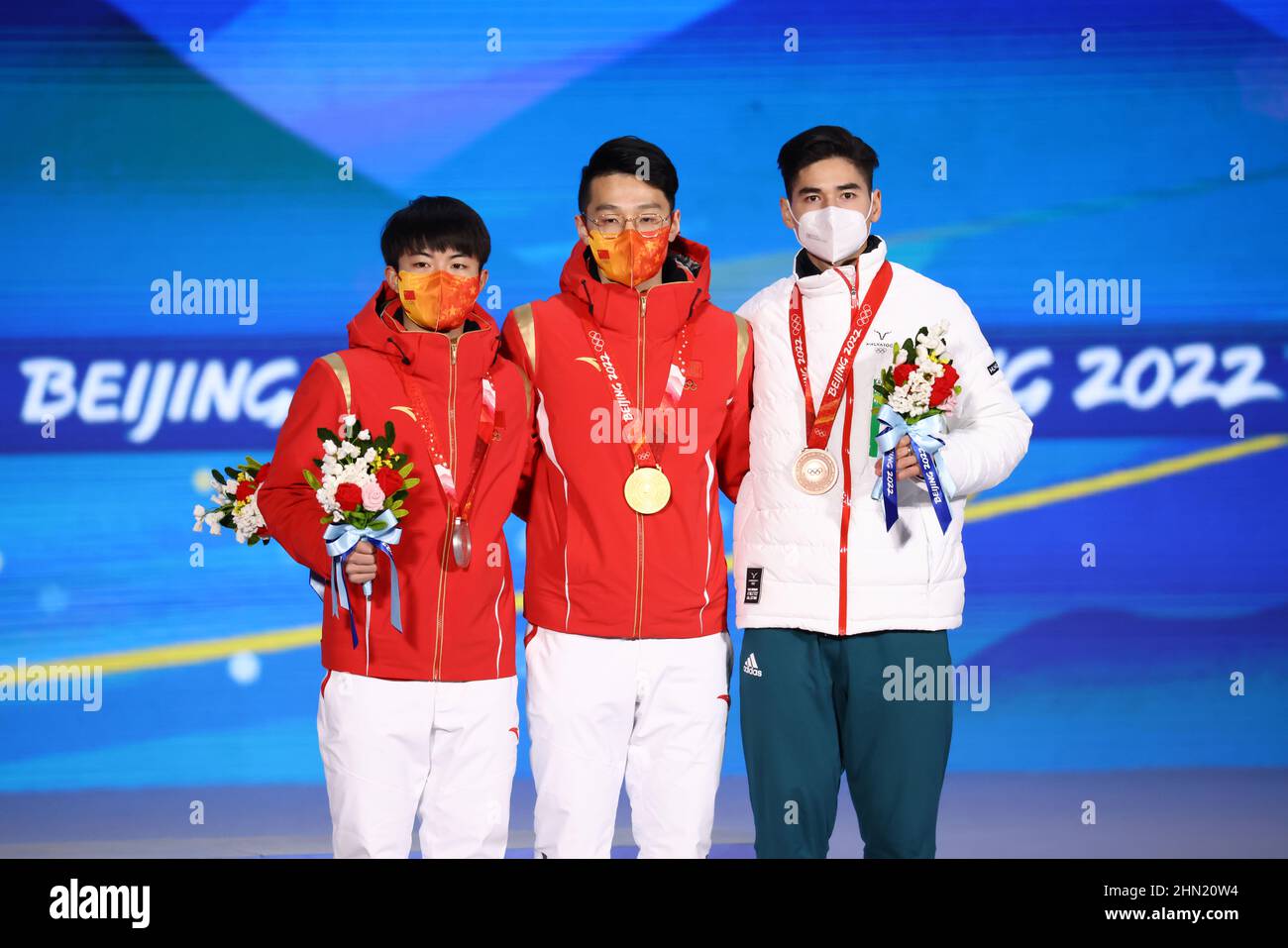 Beijing, China. 8th Feb, 2022. (L-R) Li Wenlong, Ren Ziwei (CHN), Shaoang Liu (HUN) Short Track ...