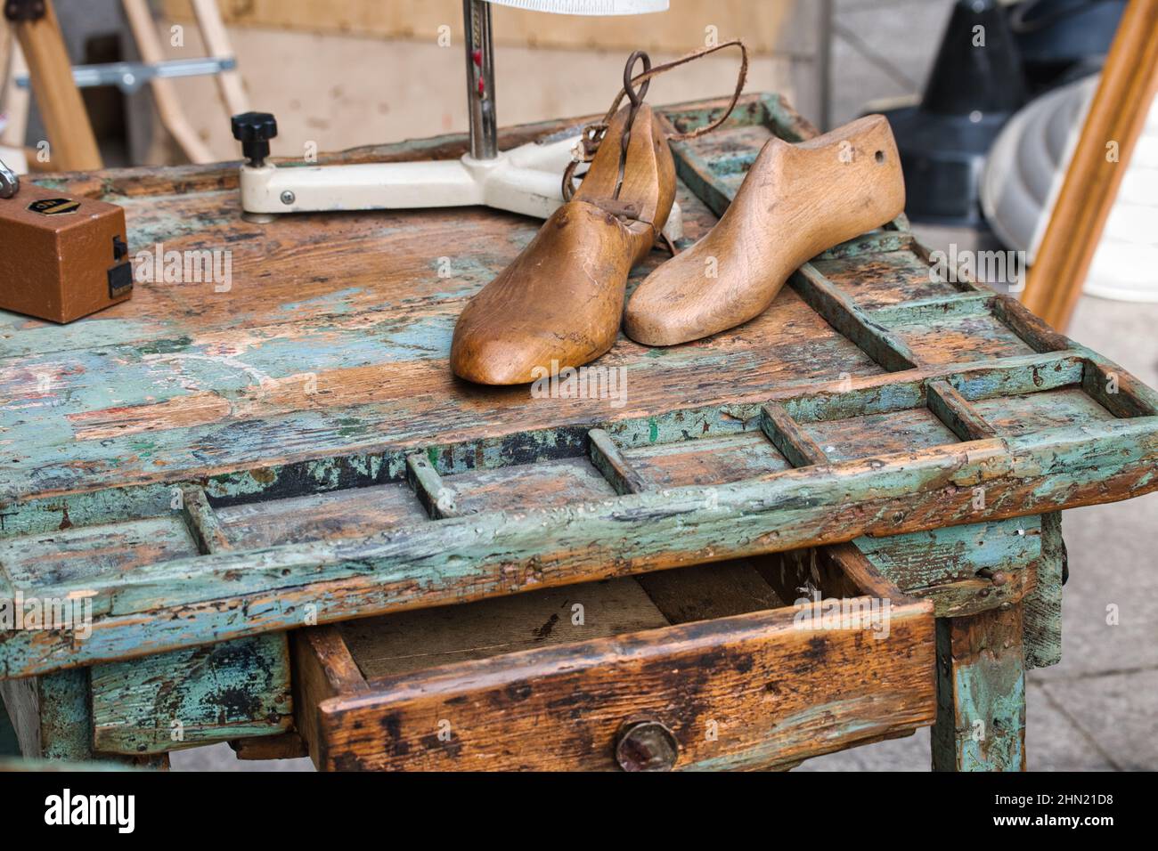 Old cobbler work table Stock Photo - Alamy