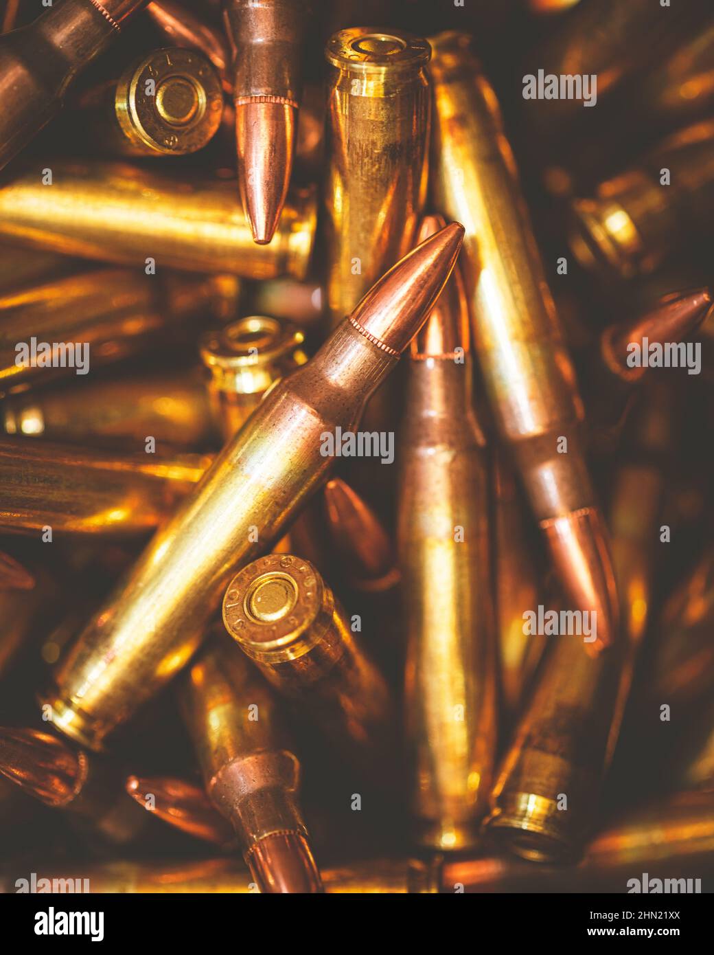 Vertical closeup shot of a pile of bullets Stock Photo - Alamy