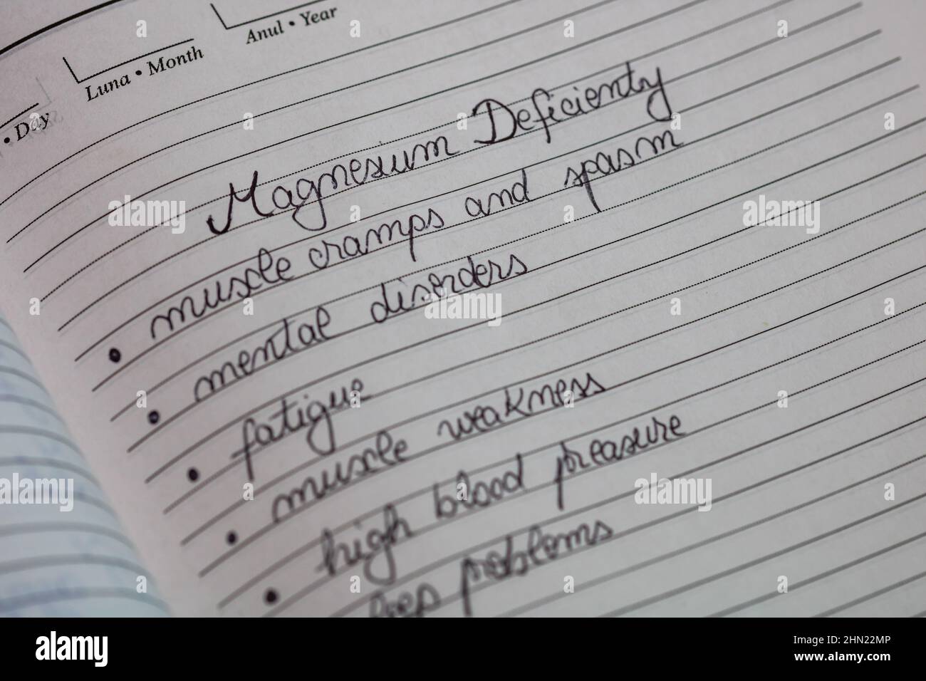 Handwritten notes on white note paper Stock Photo - Alamy