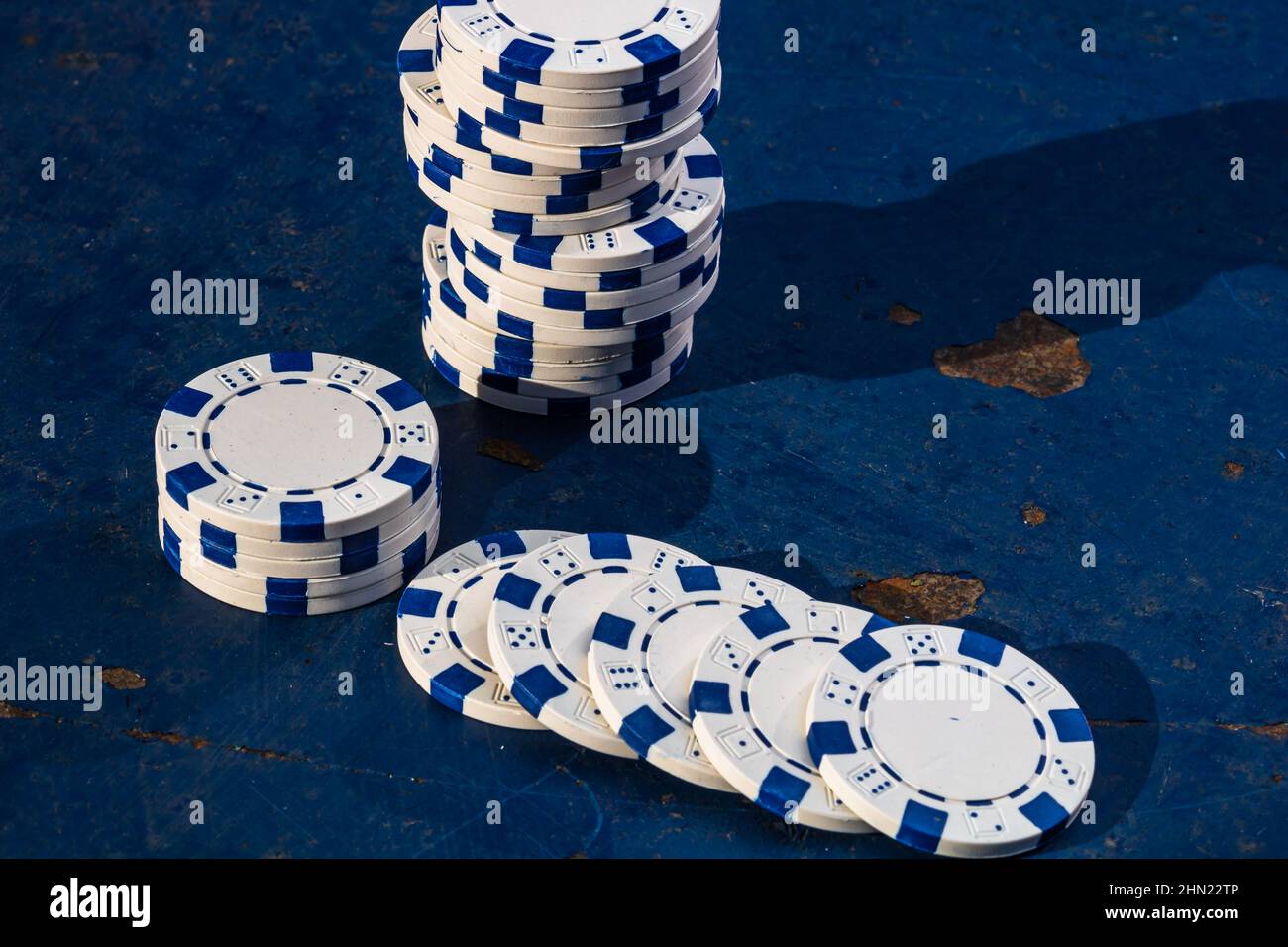 Stacks of poker chips detail with cards Stock Photo - Alamy