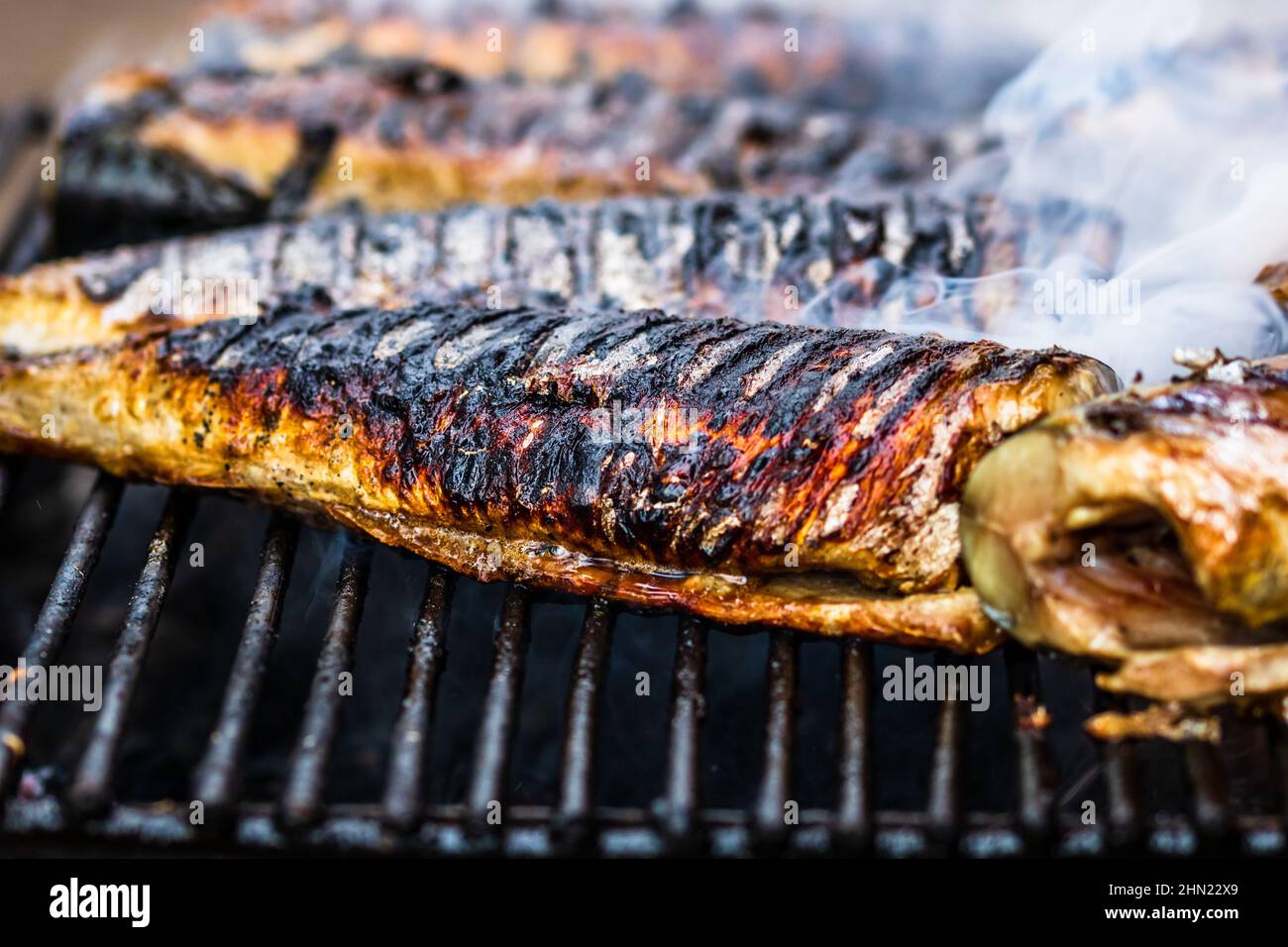 Grilled fish on charcoal grill. Fresh fish barbecue Stock Photo - Alamy