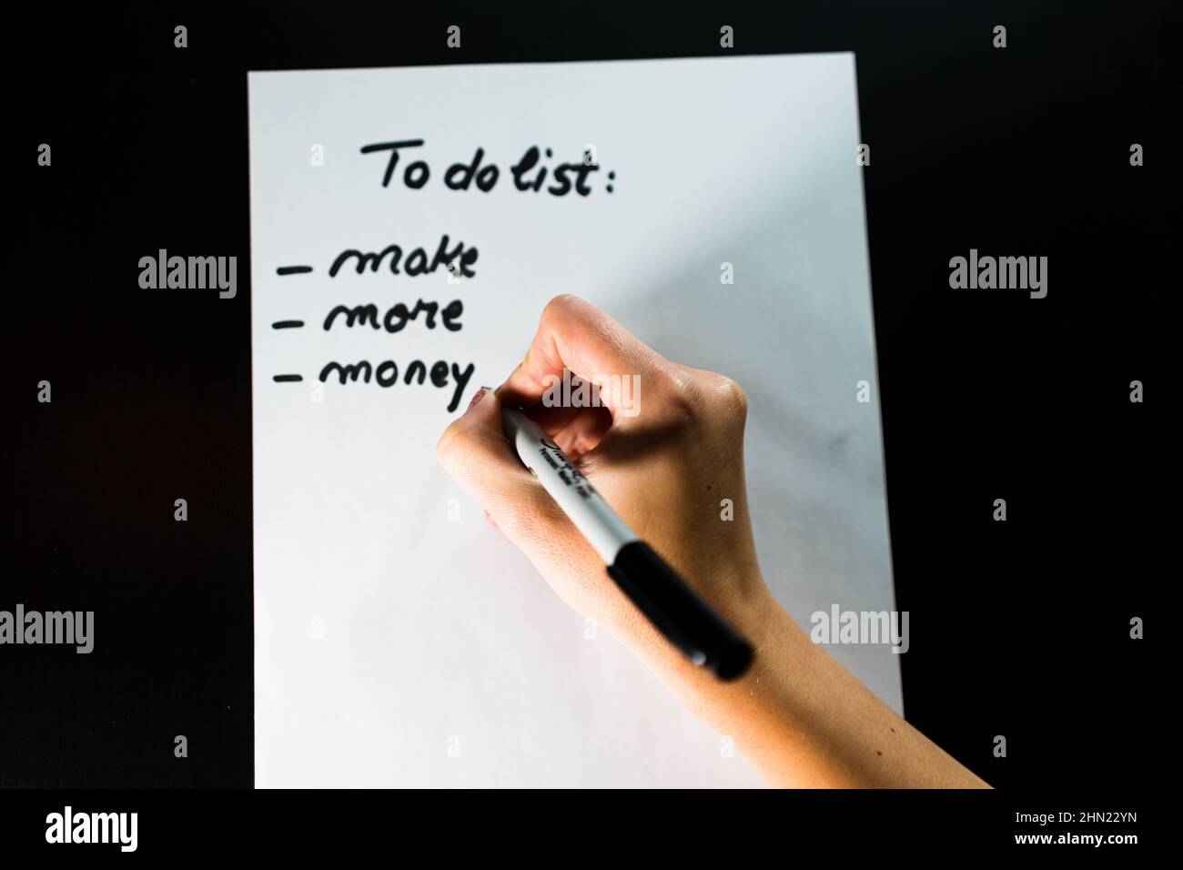 Making a list with goals or shopping list on white paper Stock Photo ...