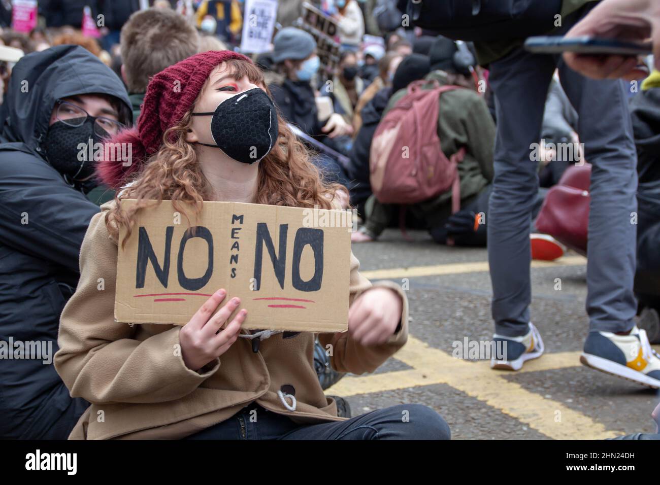 Female protester with sign Stock Photo - Alamy