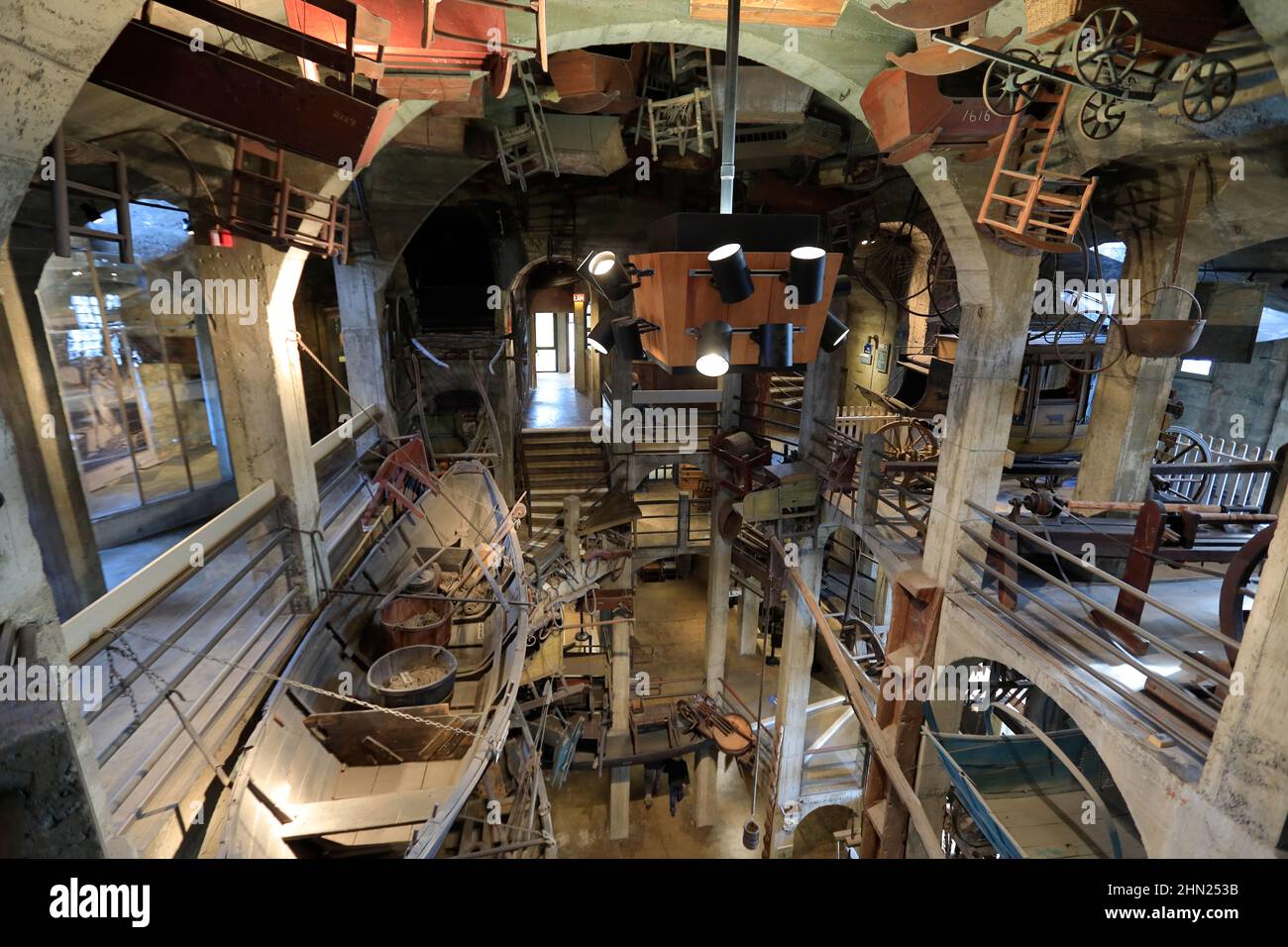 The interior view of Mercer Museum and Library with artifacts, tools ...