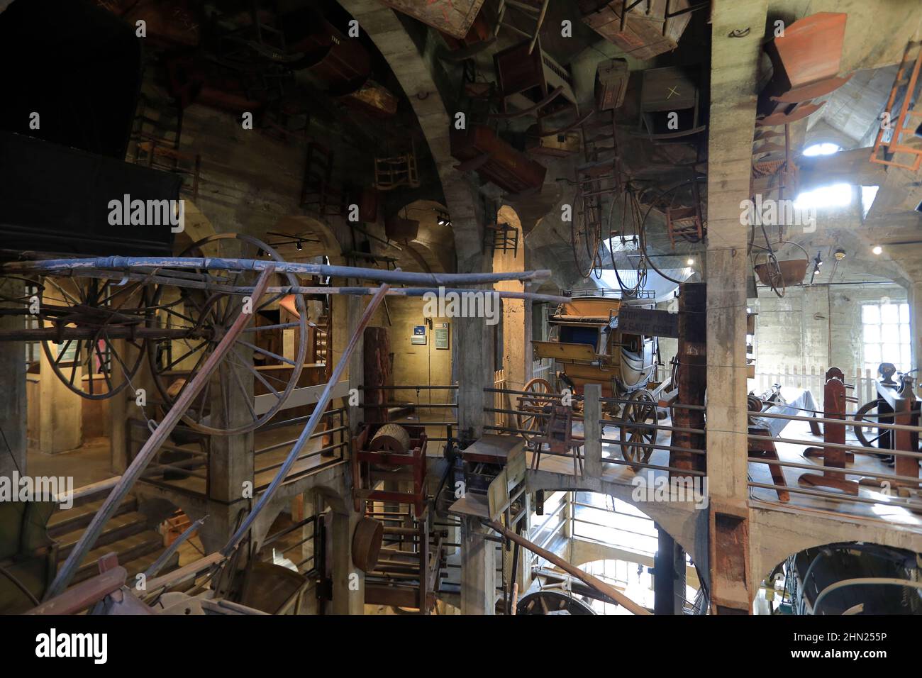 The interior view of Mercer Museum and Library with artifacts, tools ...