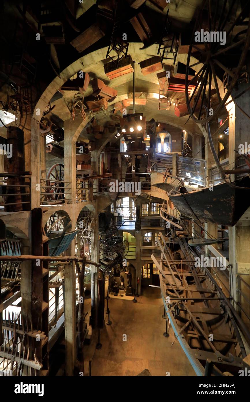 The interior view of Mercer Museum and Library with artifacts, tools ...