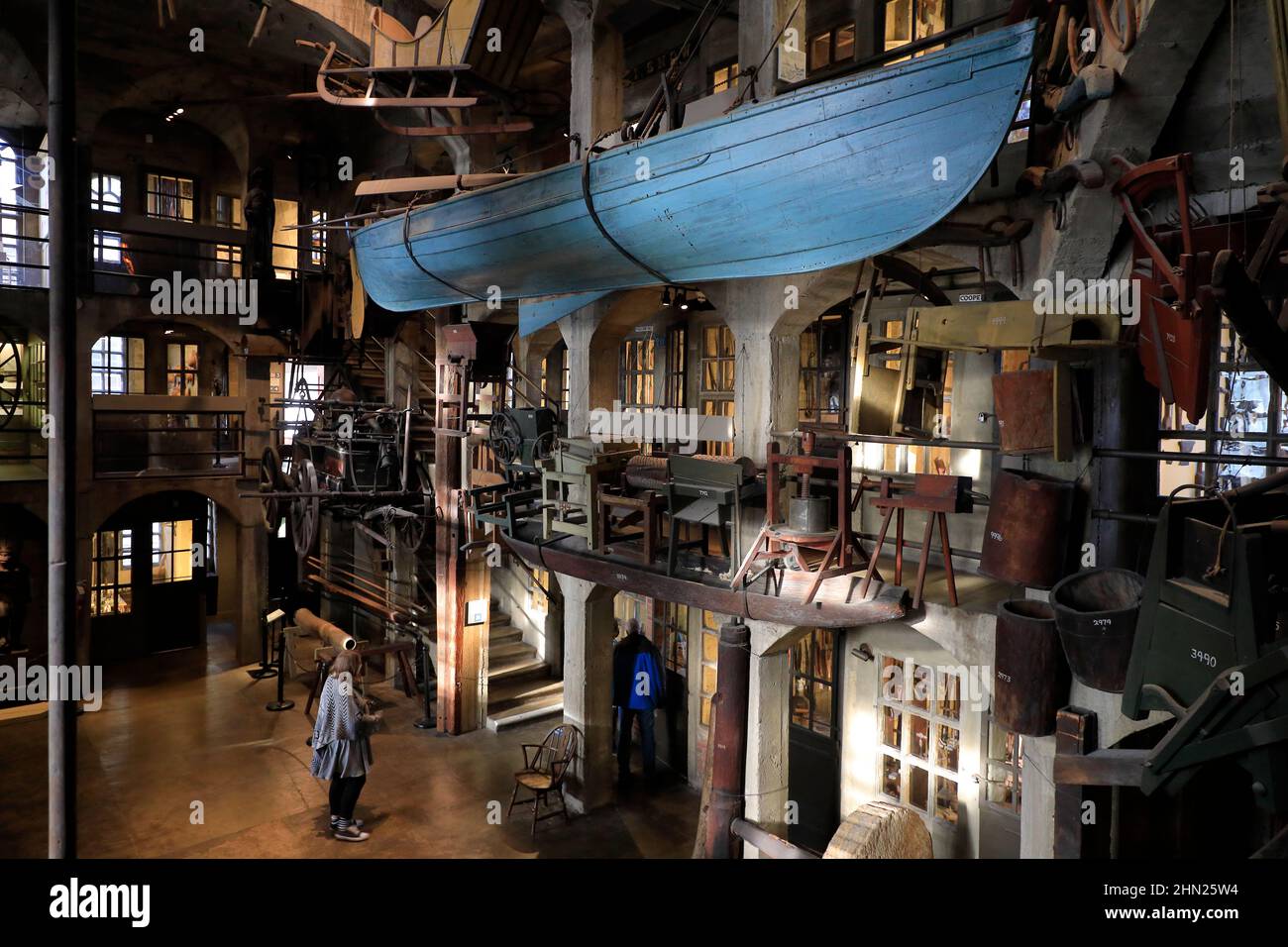 The interior view of Mercer Museum and Library with artifacts, tools ...