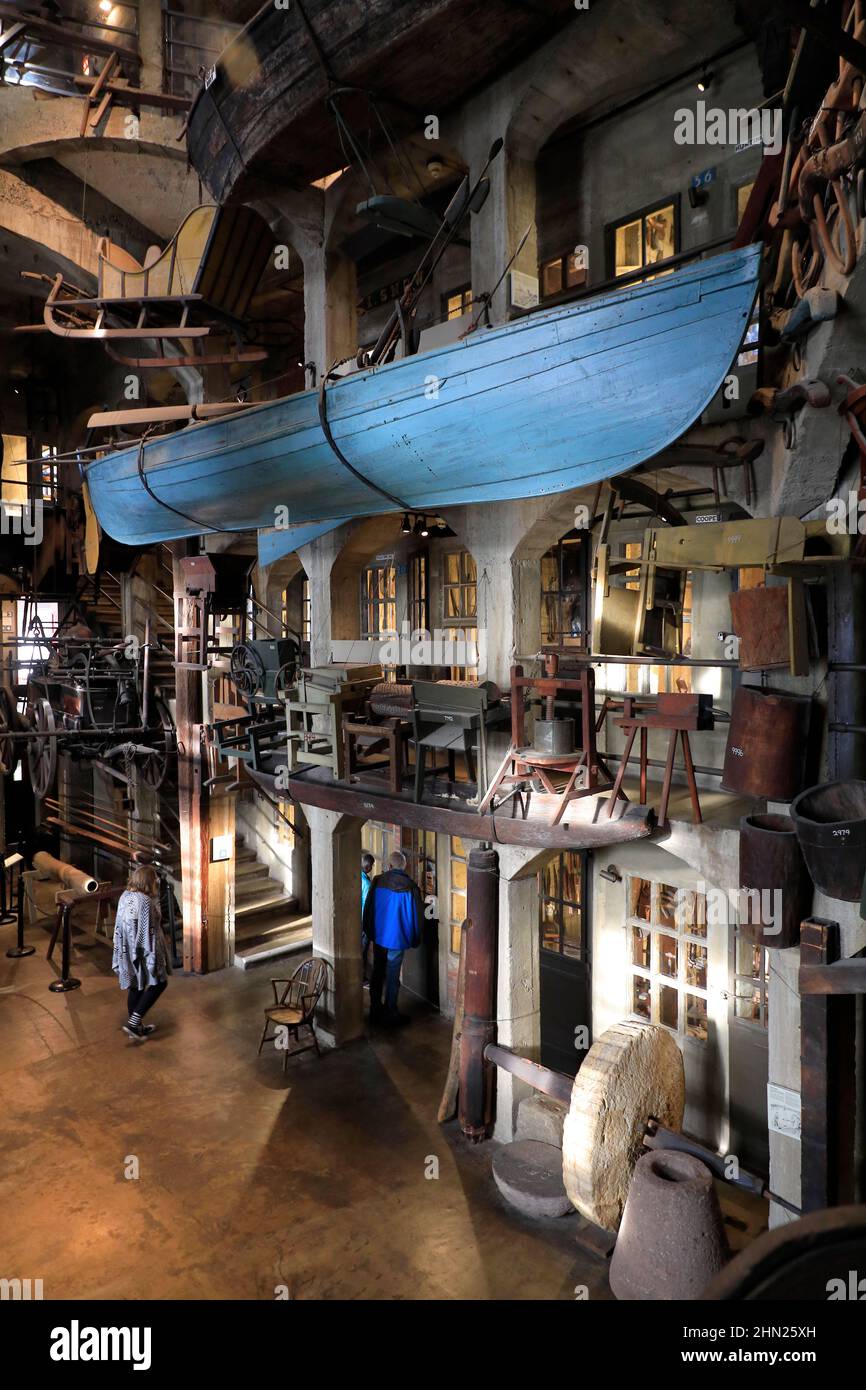 The interior view of Mercer Museum and Library with artifacts, tools ...